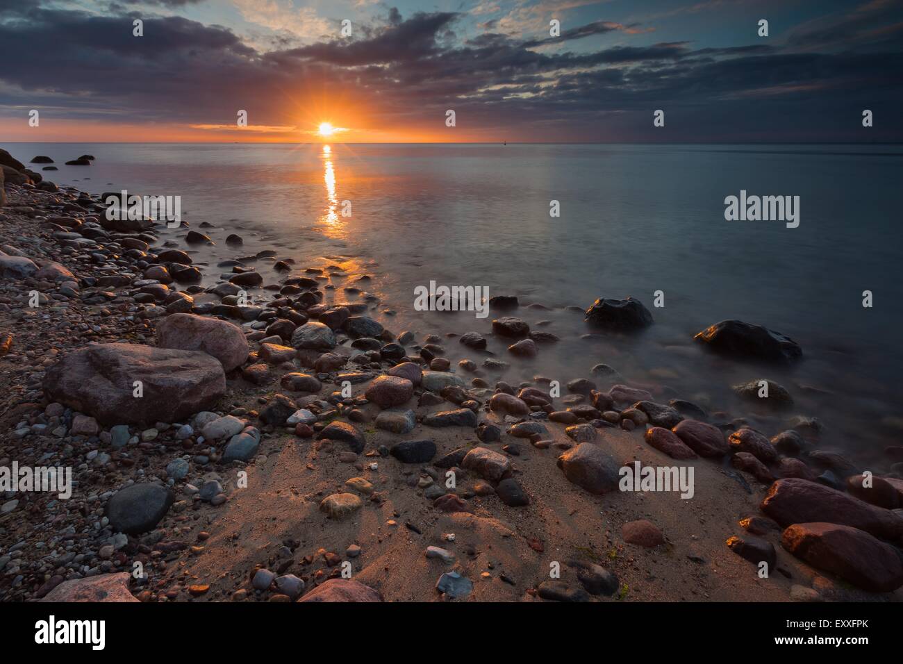 Beautiful long exposure landscape of rocky sea shore. Tranquil scene of ...
