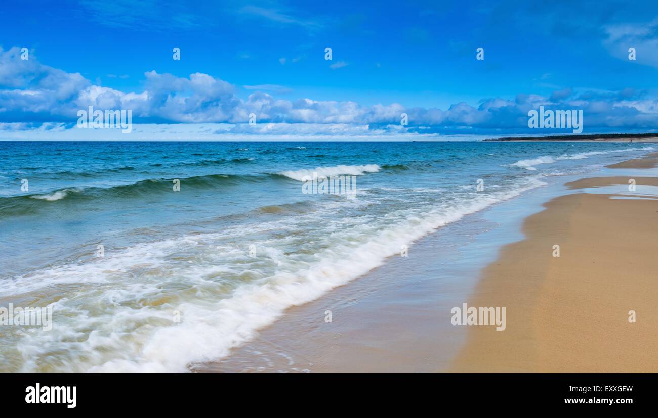 Beautiful beach landscape with cloudy sky and sea with waves. Baltic ...