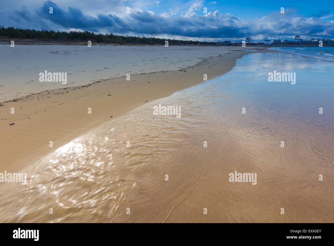 Beautiful beach landscape with cloudy sky and sea with waves. Baltic ...