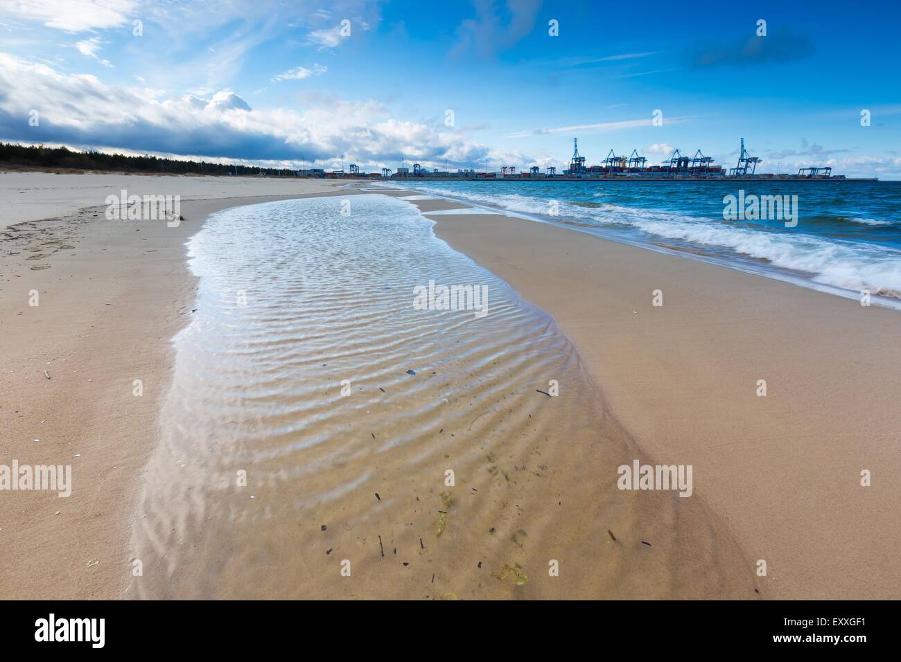 Beautiful beach landscape with cloudy sky and sea with waves. Baltic ...