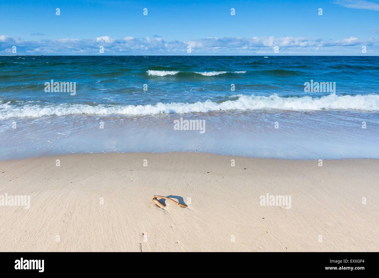 Beautiful beach landscape with cloudy sky and sea with waves. Baltic ...