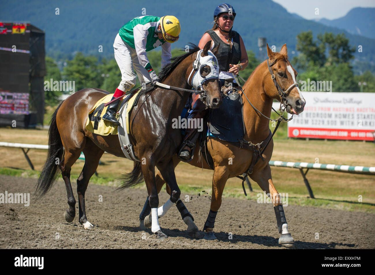 Post parade ride at Vancouver Hastings Exhibition Park race track Stock ...