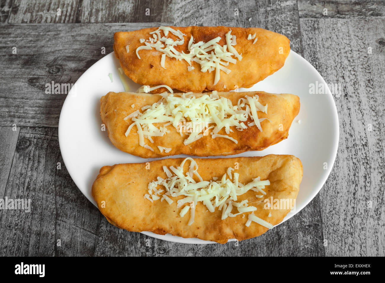 Homemade panzerotti with cheese Stock Photo - Alamy