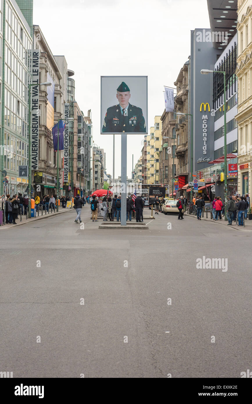 Berlin Checkpoint Charlie, view of a large portrait of a US soldier ...