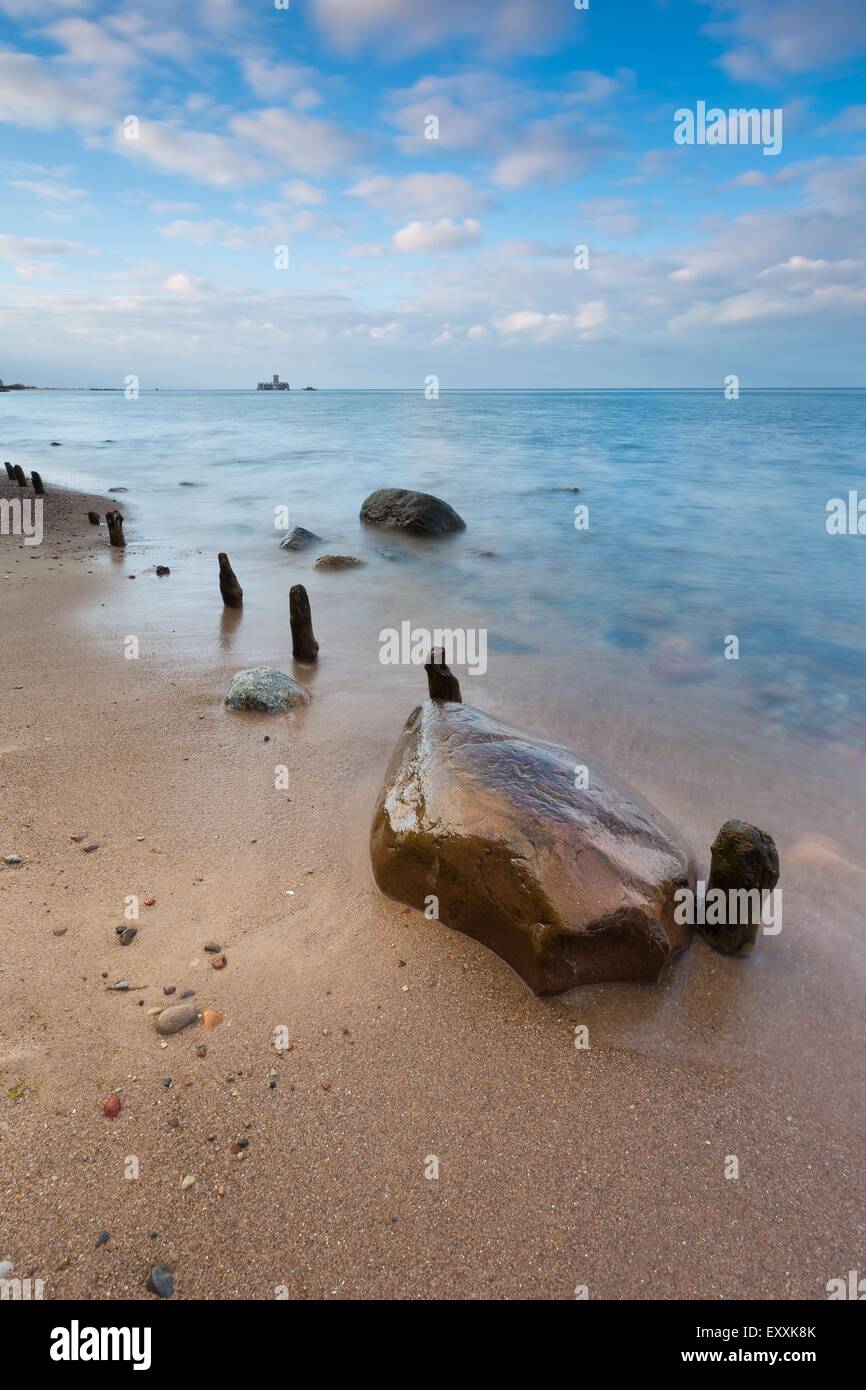 Beautiful long exposure landscape of rocky sea shore. Tranquil scene of ...