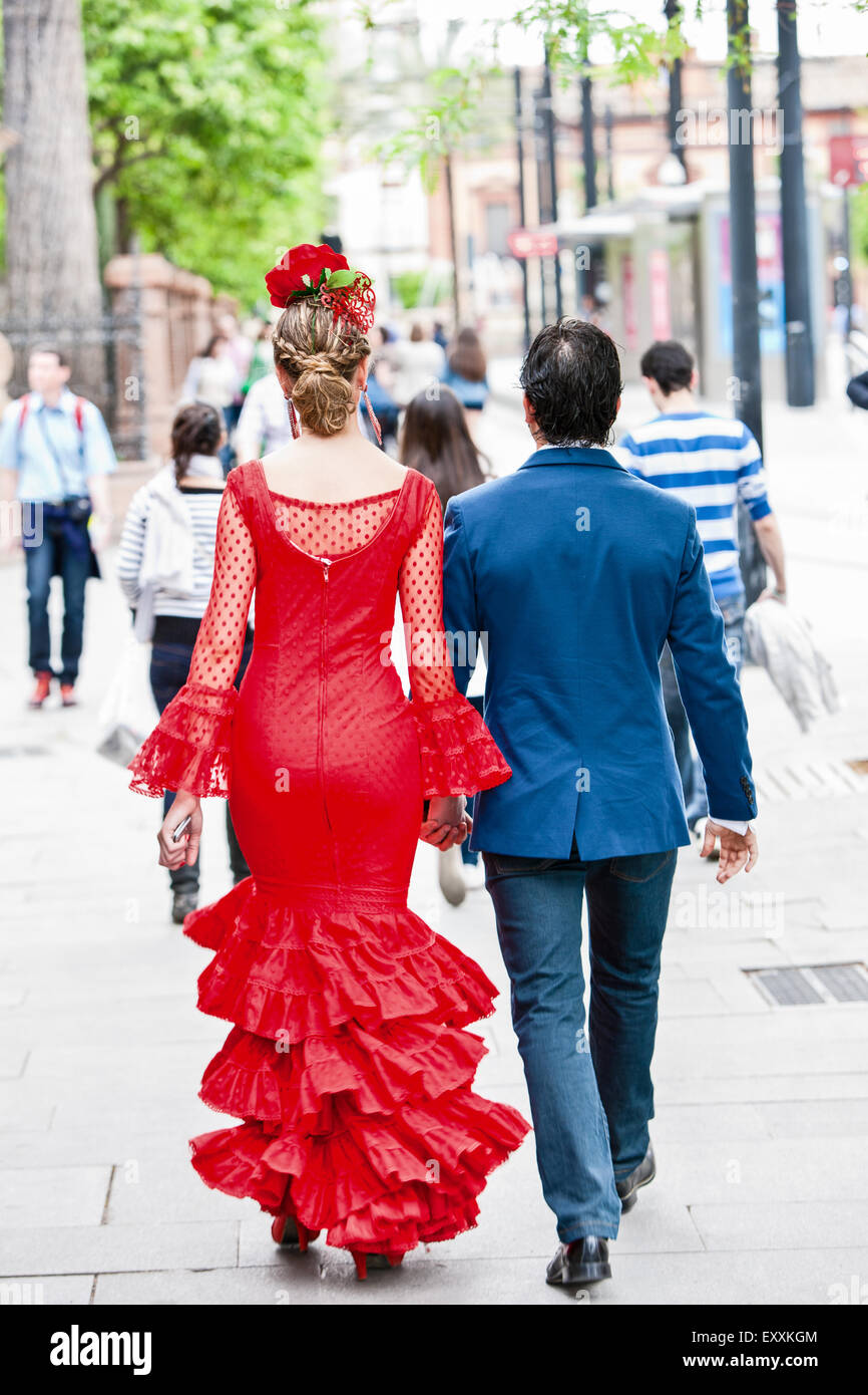 In traditional Seville dress in Seville, Andalucia, Spain, Europe ...