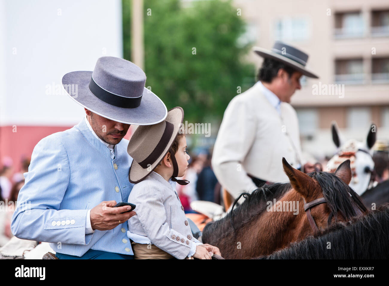Horse rider,and,boy,child,riders in traditional horse riding dress in ...
