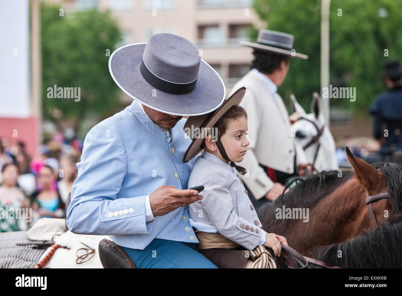 Horse rider,and,boy,child,riders in traditional horse riding dress in ...