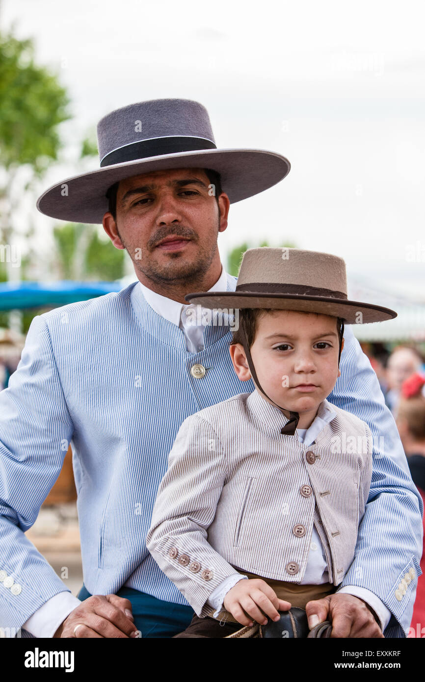 Horse rider,and,boy,child,riders in traditional horse riding dress in ...