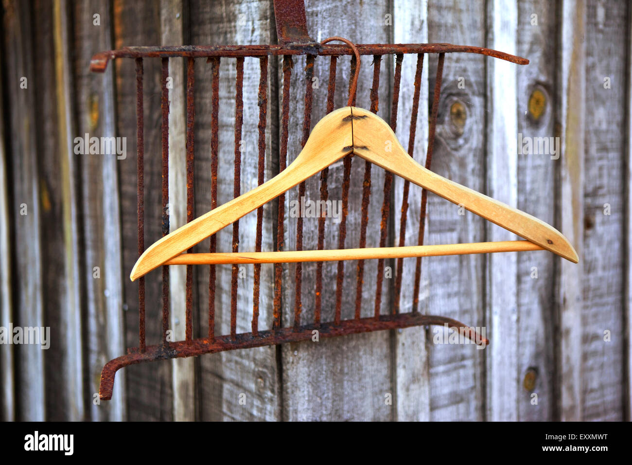 Hanger and rusty grill in a flea market Stock Photo - Alamy