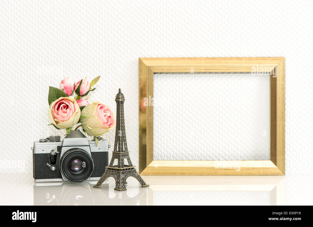 Golden picture frame, rose flowers and no name vintage camera Stock ...