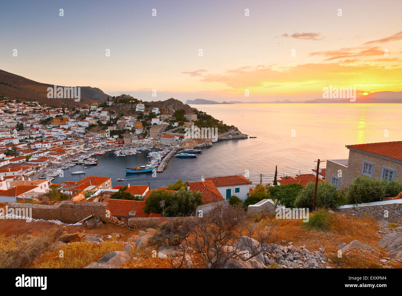 View of the port of Hydra at the sunset Stock Photo - Alamy