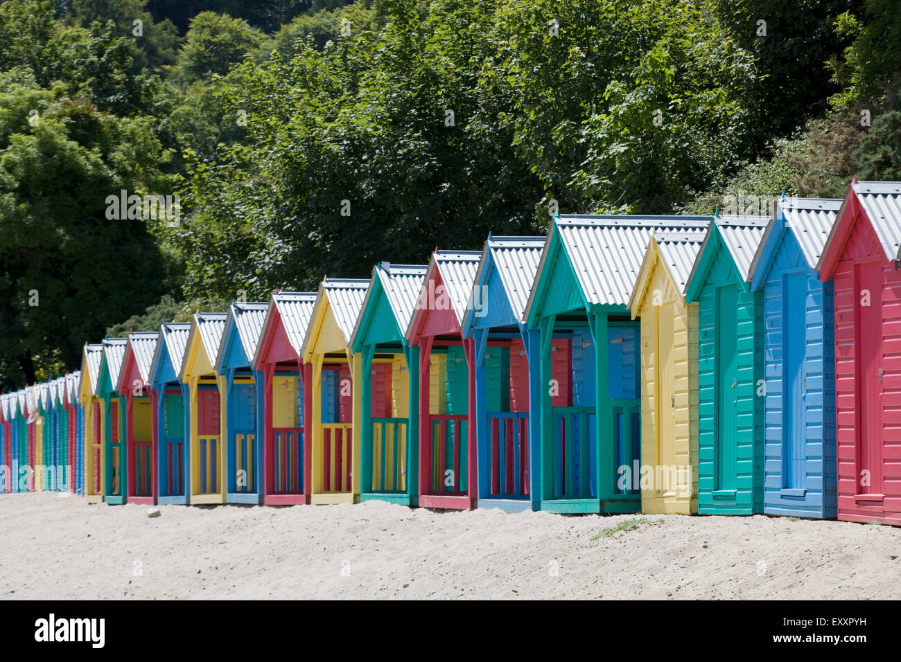 Colourful beach huts at a traditional British Beach Stock Photo - Alamy
