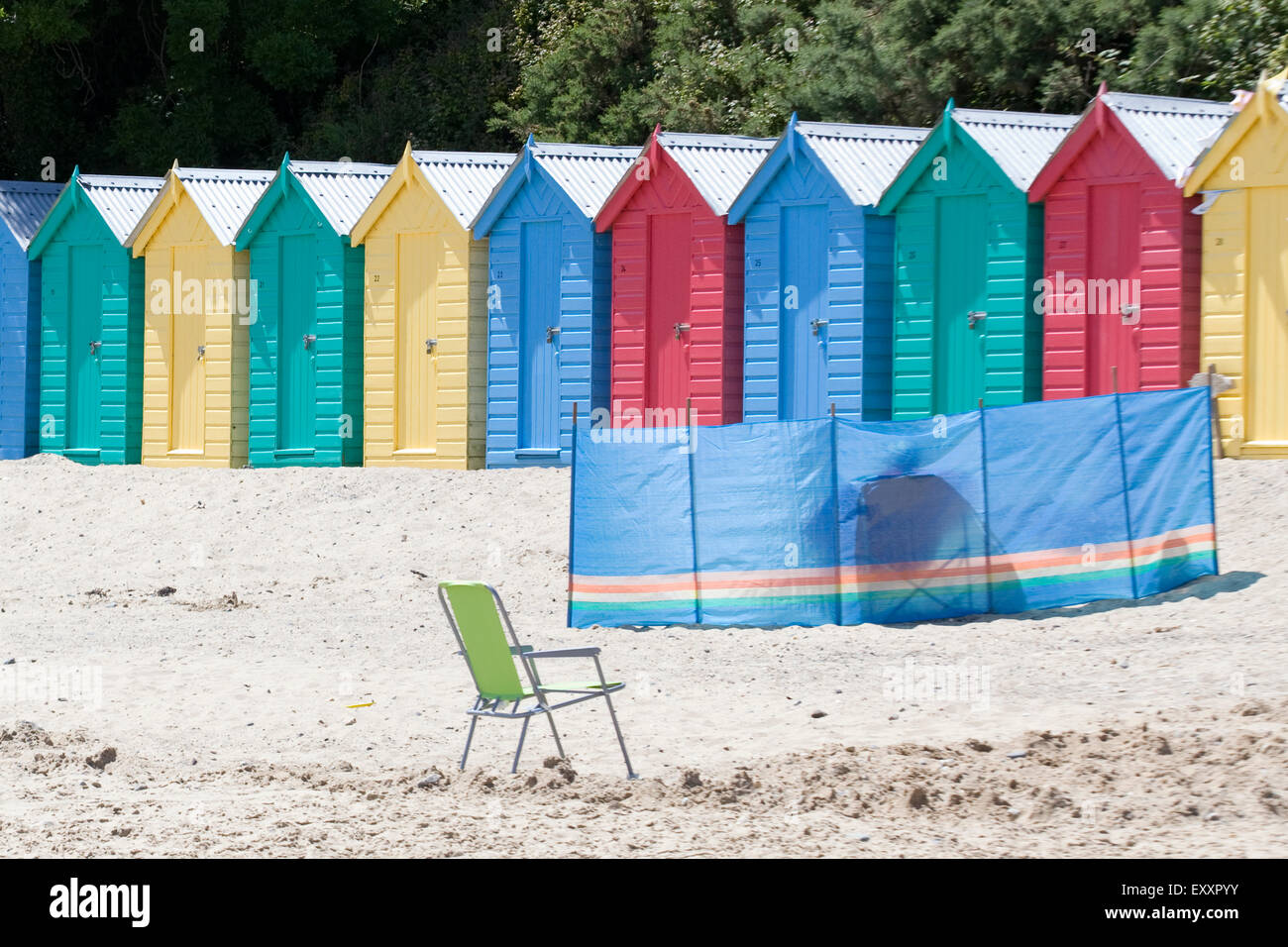 Colourful beach huts at a traditional British Beach Stock Photo - Alamy