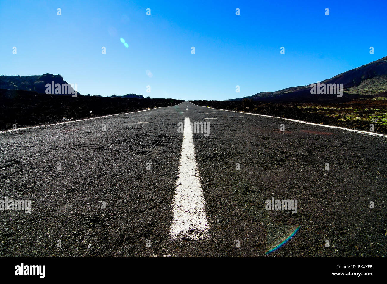 Long Lonely Road Stock Photo - Alamy