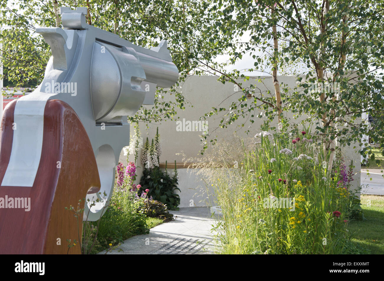 The Ready..Aim…Flower conceptual garden at RHS Hampton Court Palace ...