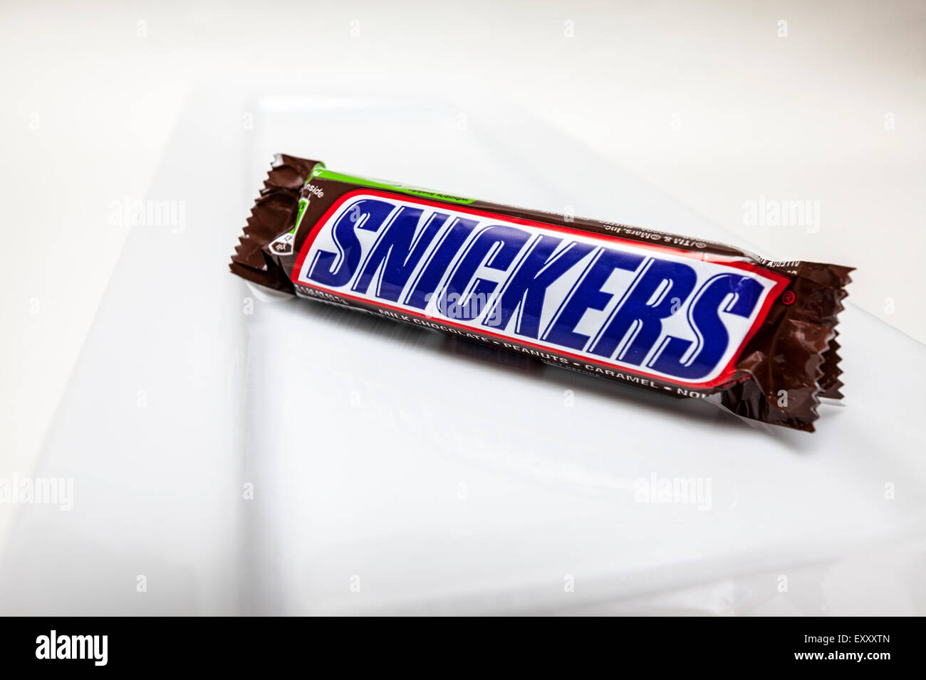 A Snickers Candy bar on a white background Stock Photo - Alamy