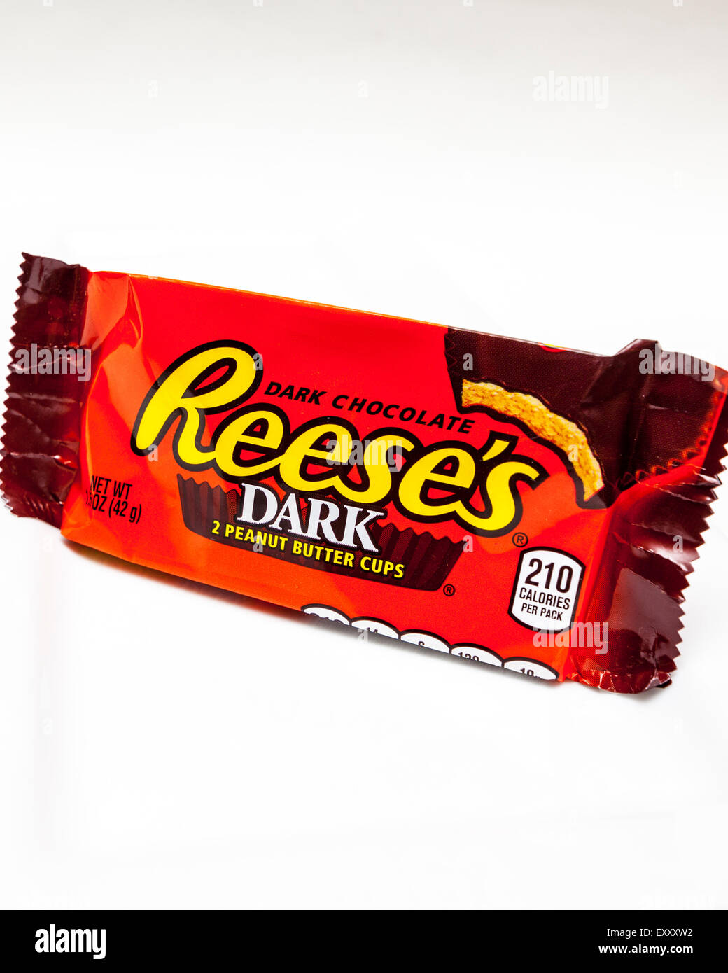 A package of Reeses Dark Chocolate peanut butter cups on a white ...