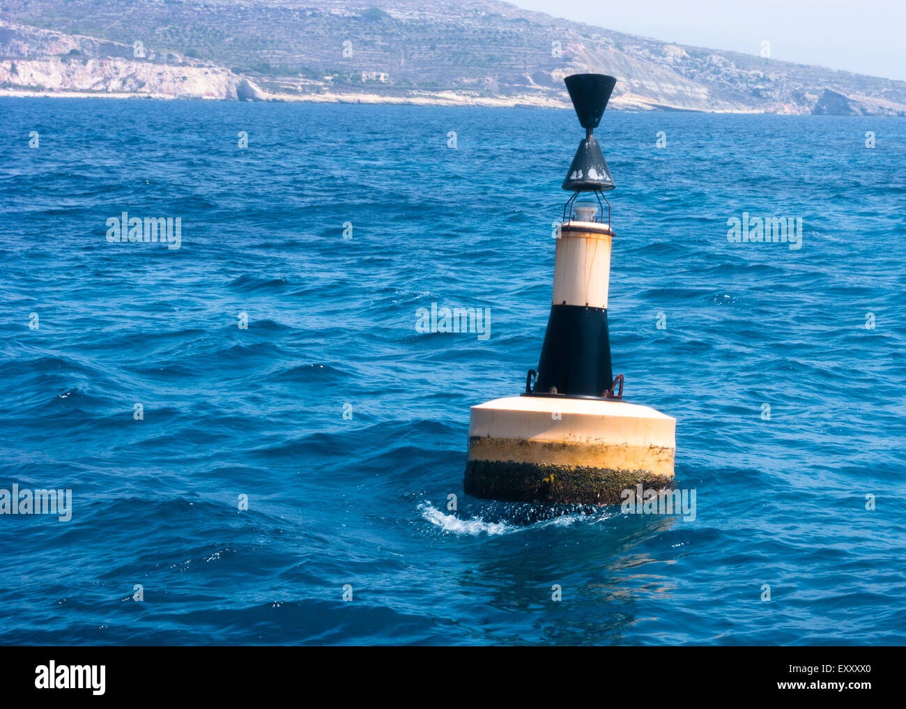 Picture of buoy, floating in blue, vibrant sea Stock Photo - Alamy