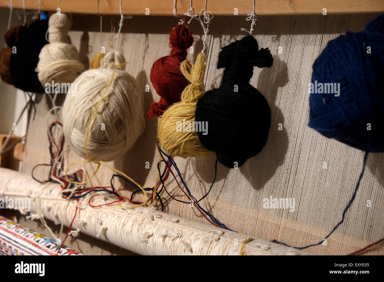Different coloured yarns hanging on a loom displayed at the Azerbaijan ...