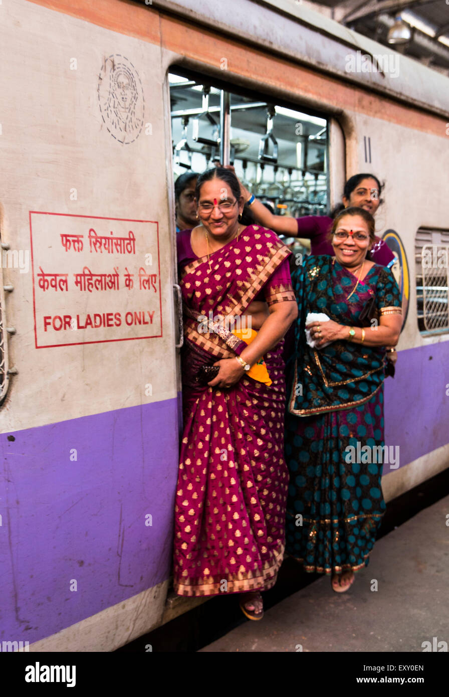 Women exiting a "Ladies Only" train car in the main train station ...
