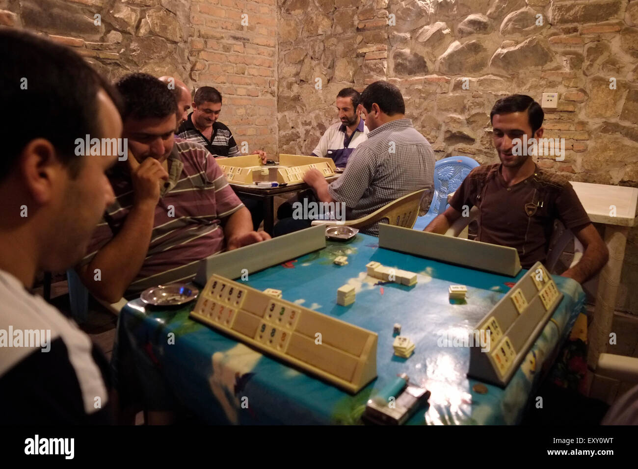 Men playing Rummikub in a teahouse in the town of Shaki or Sheki in ...