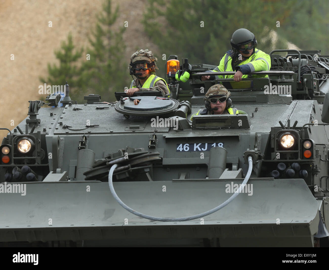 Crew of a British Army tank at Bovington Military training area, July ...