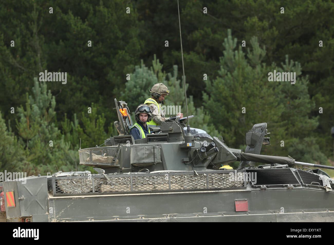Crew of a British Army tank at Bovington Military training area, July ...