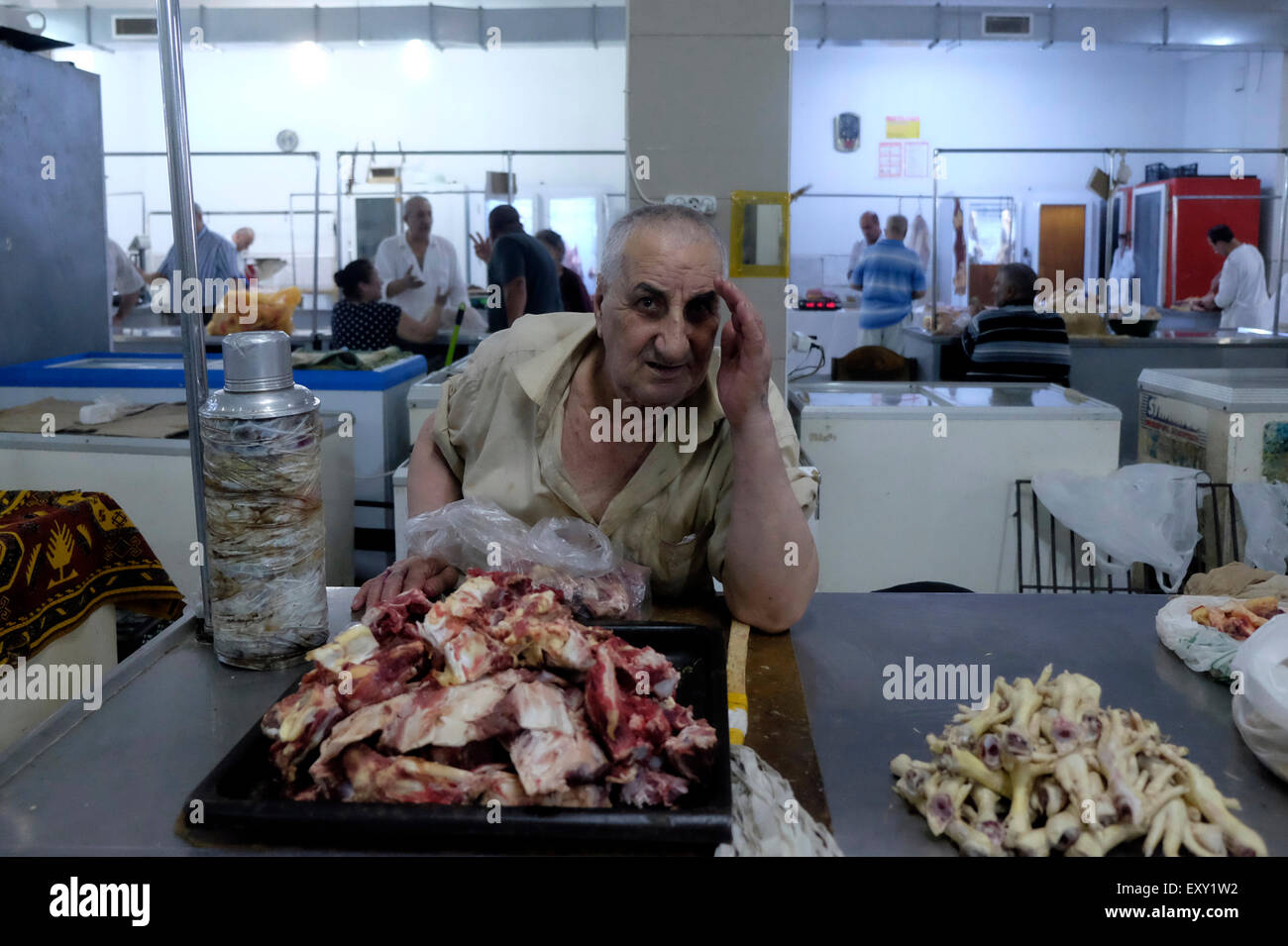 A butcher in Taza Bazaar market in the city of Baku in Azerbaijan Stock ...