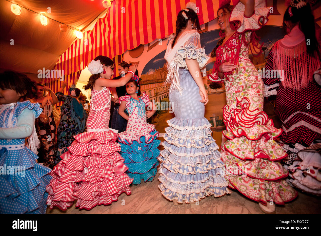 Dancing Sevilla style. In large tent used by general public. In ...