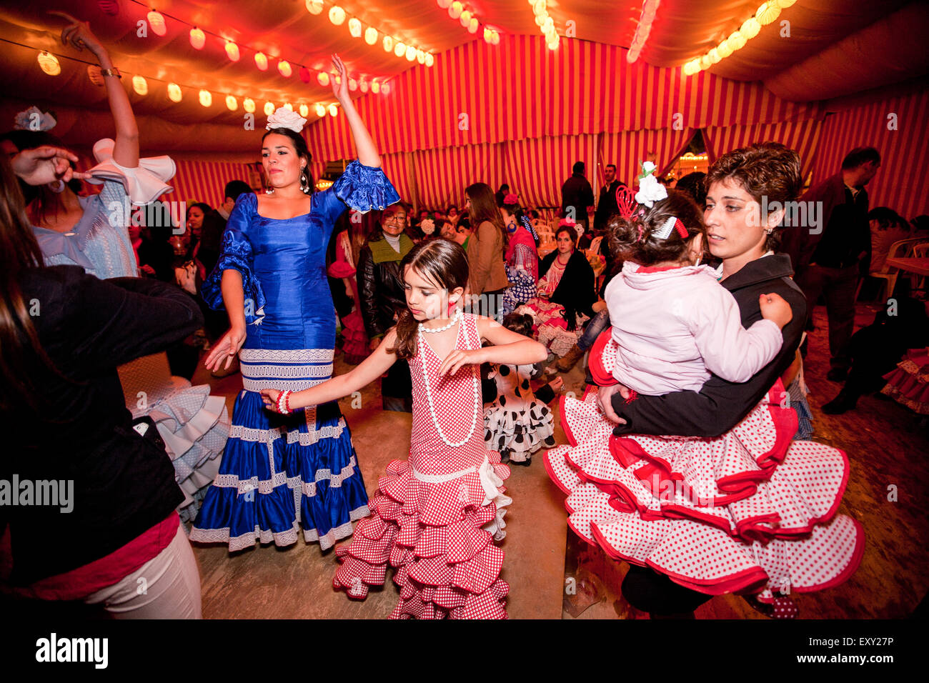 Dancing Sevilla style. In large tent used by general public. In ...