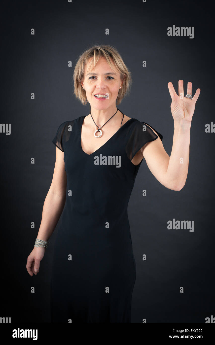 Beautiful woman doing different expressions in different sets of ...