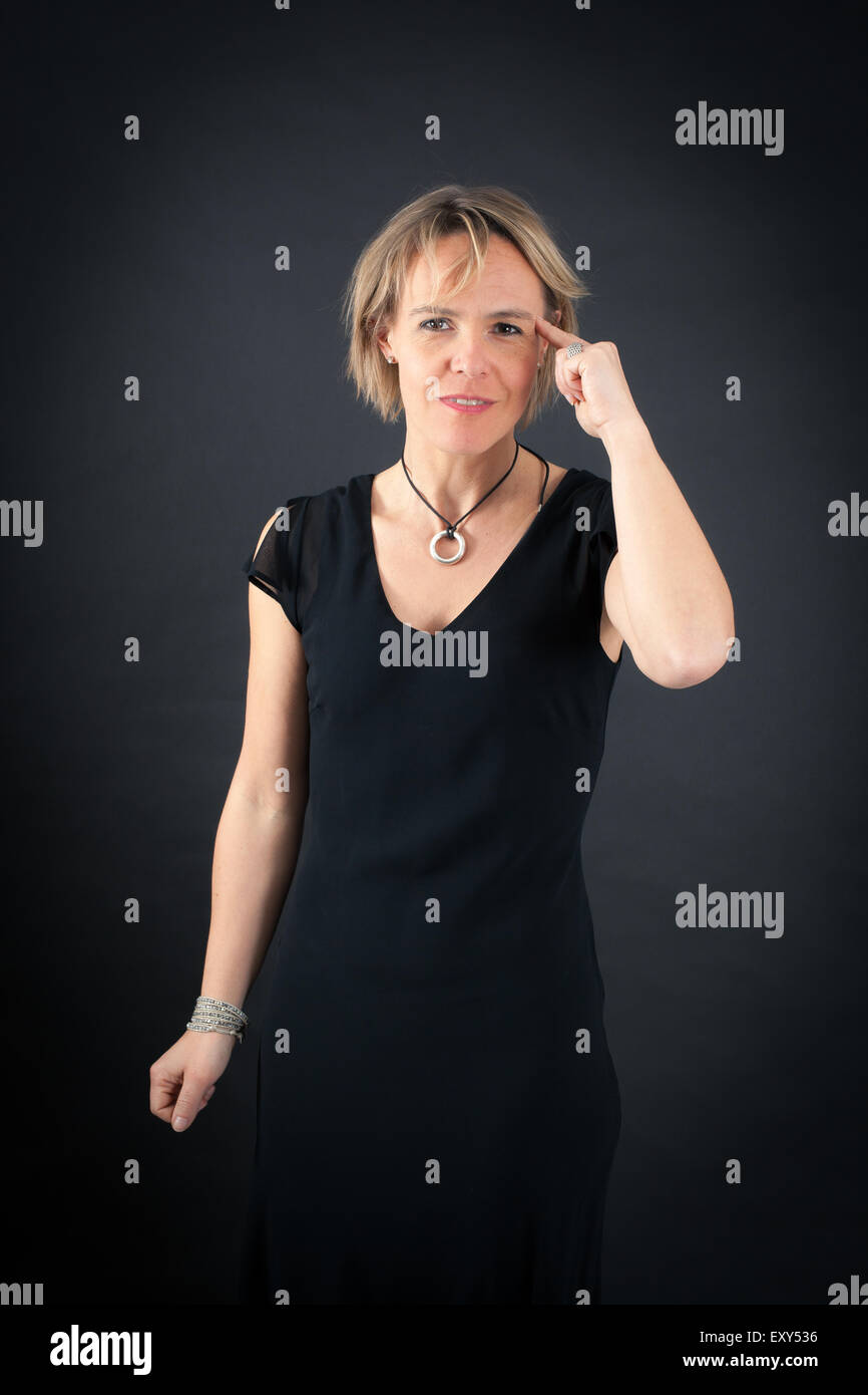 Beautiful woman doing different expressions in different sets of ...