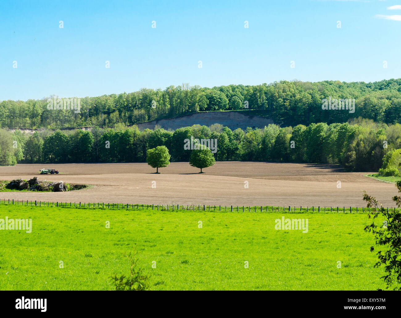 Cliff overlooking fields Stock Photo - Alamy