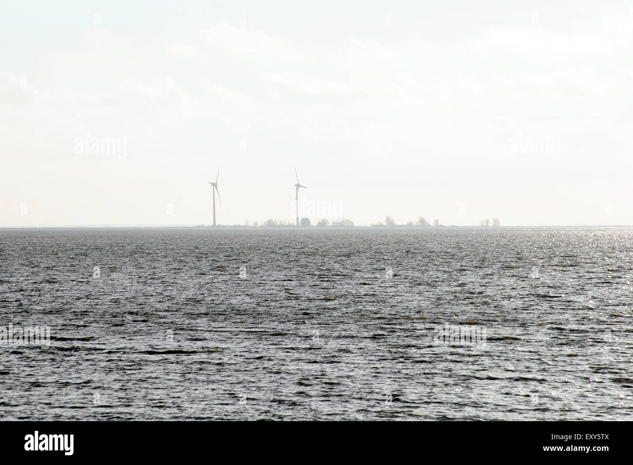 Island with wind turbines Stock Photo - Alamy