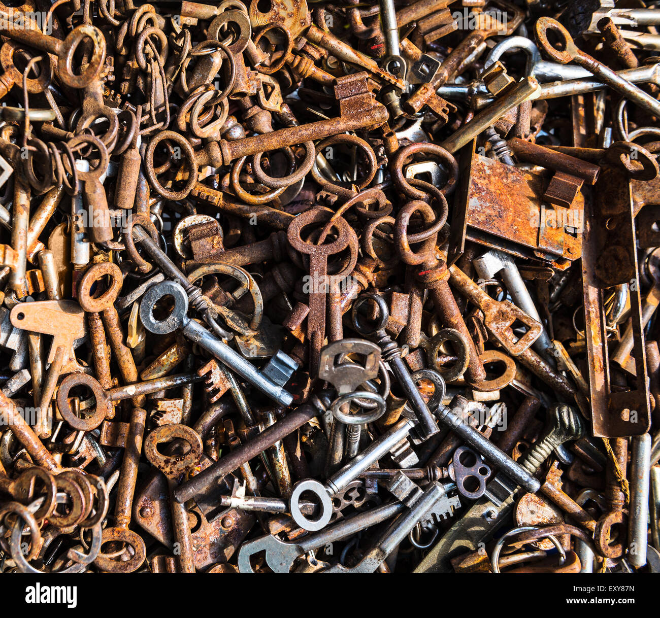 Background with rusty keys from different locks Stock Photo - Alamy