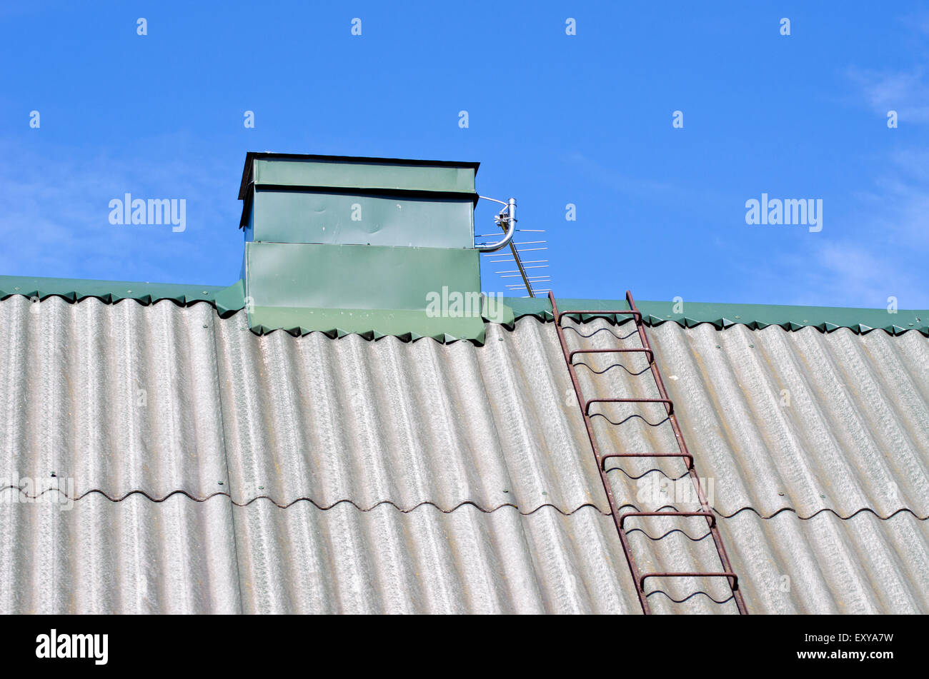 new house roof with chimney and ladder on ecological slate Stock Photo ...