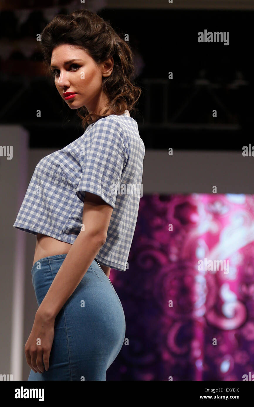 Fashion Model rehearses her catwalk on the runway before the fashion ...