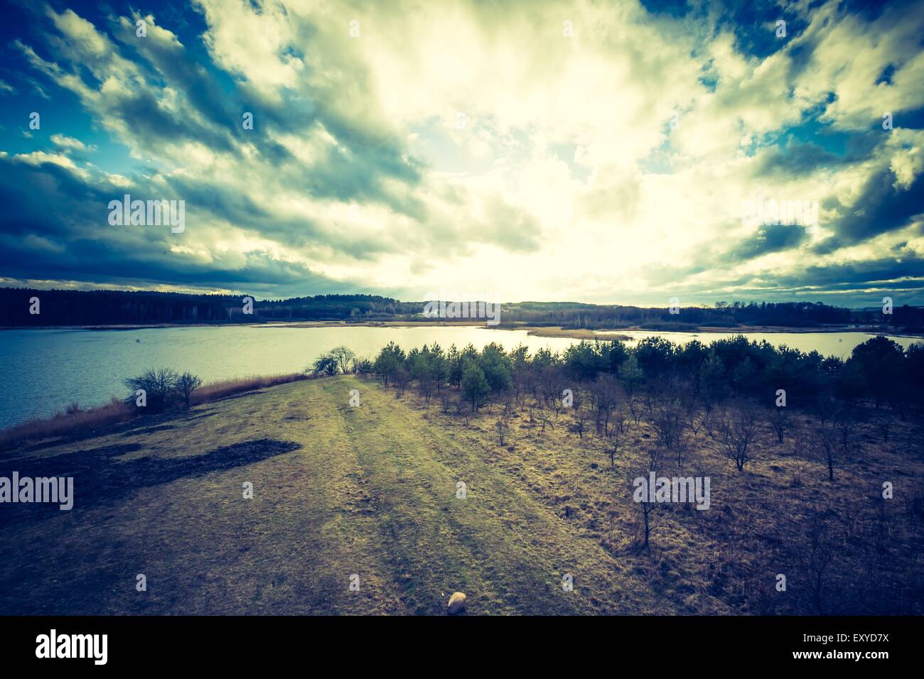 Vintage photo of dramatic cloudscape over land. Photo with vintage mood ...