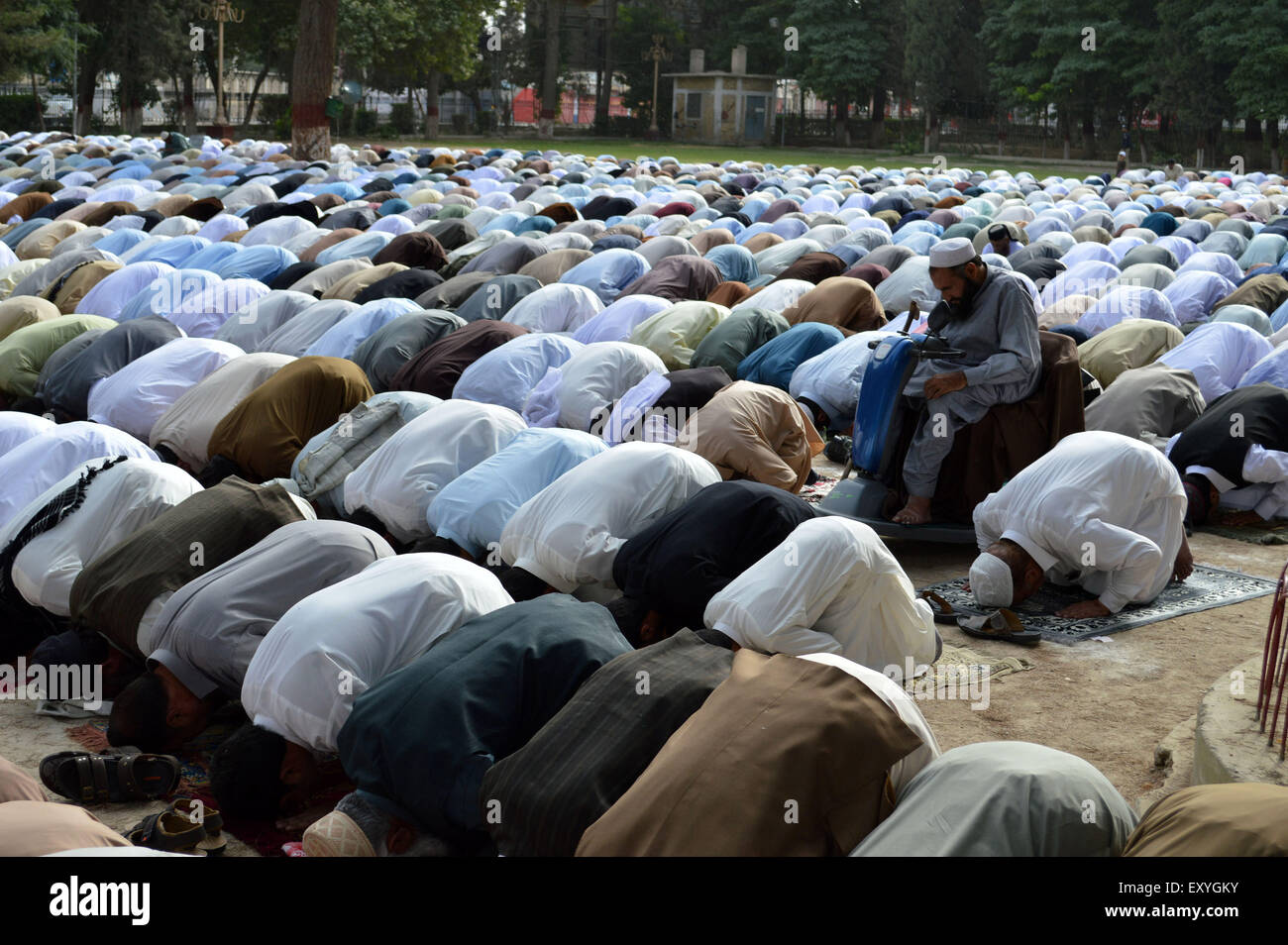 Quetta. 18th July, 2015. Pakistani Muslims offer prayers to celebrate ...