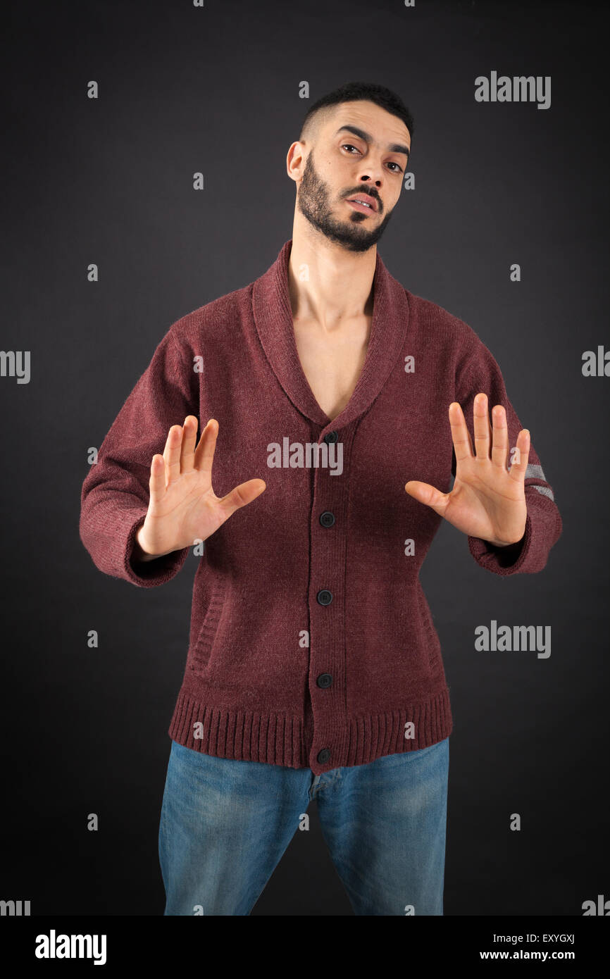 Handsome man doing different expressions in different sets of clothes ...