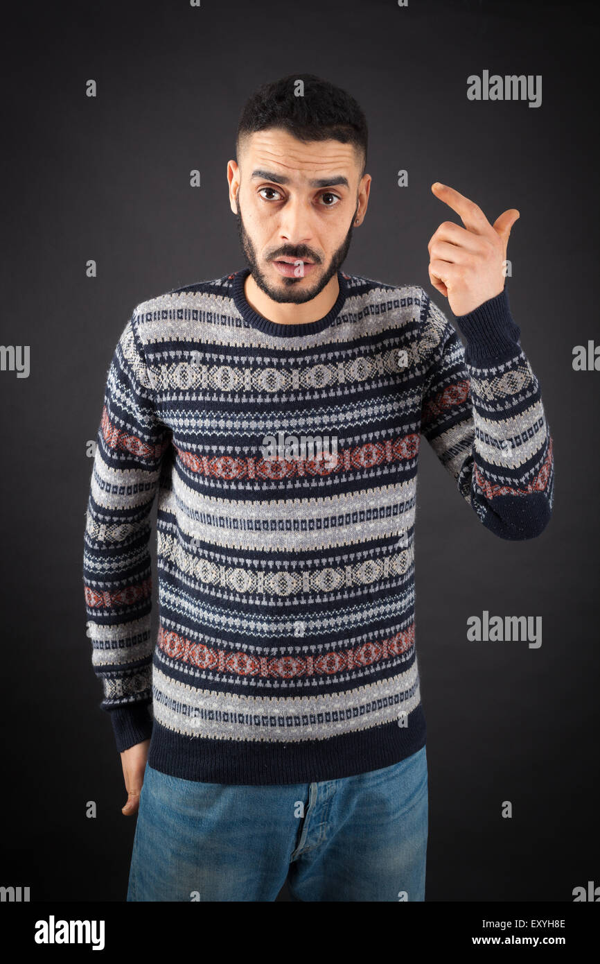 Handsome man doing different expressions in different sets of clothes ...
