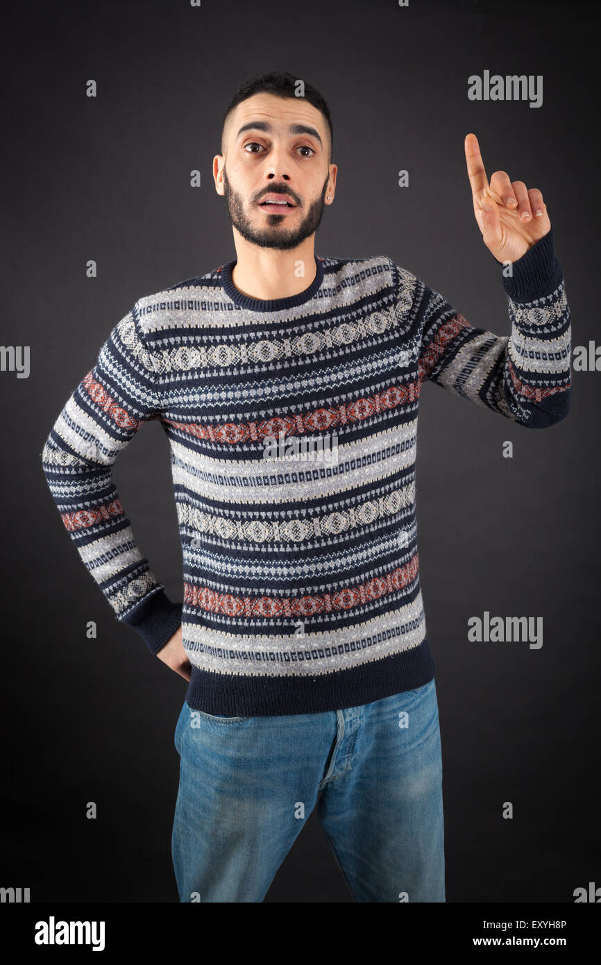 Handsome man doing different expressions in different sets of clothes ...
