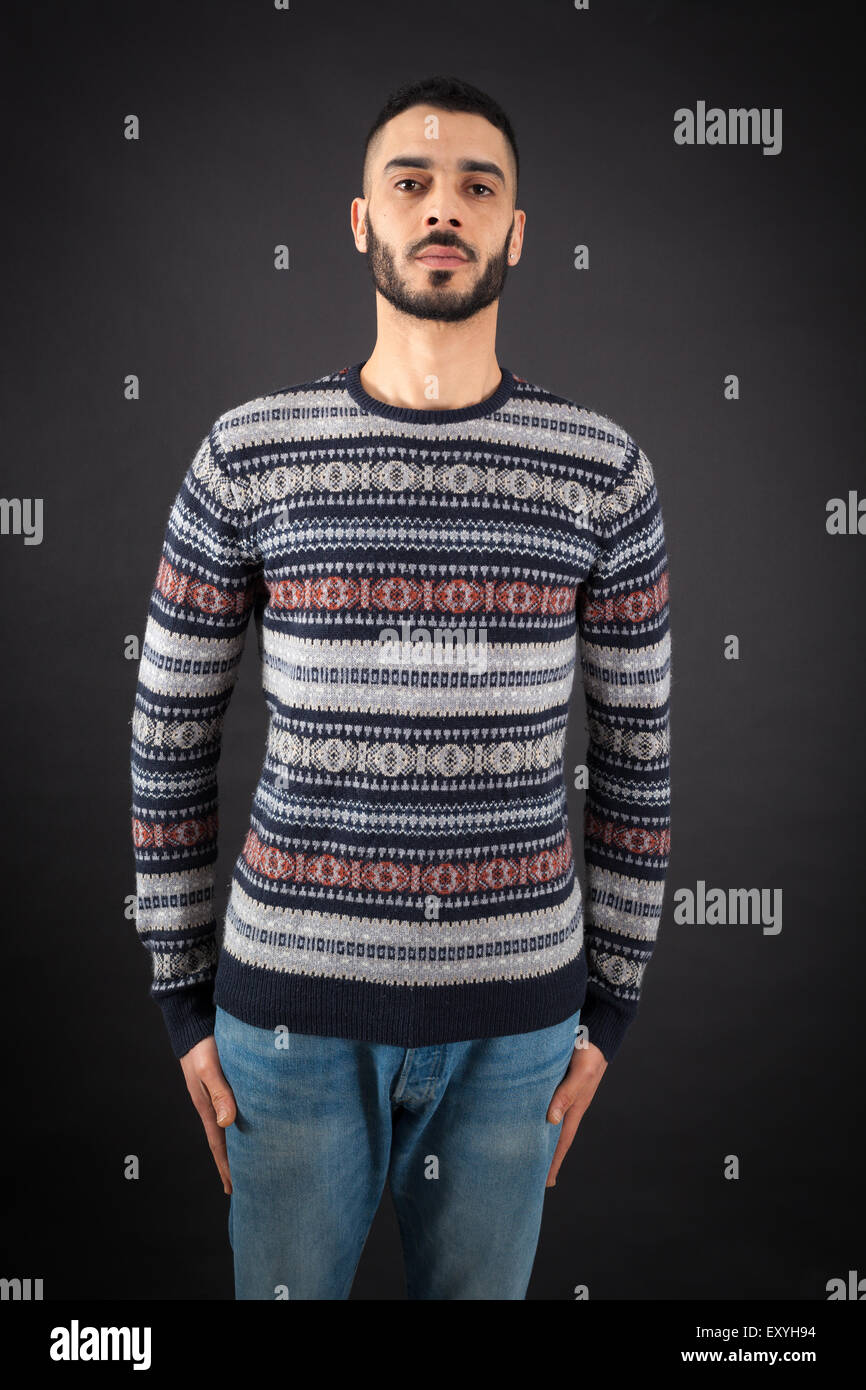 Handsome man doing different expressions in different sets of clothes ...