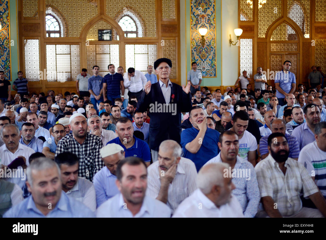Baku, Azerbaijan. 18th July, 2015. Local Muslims attend a prayer ...