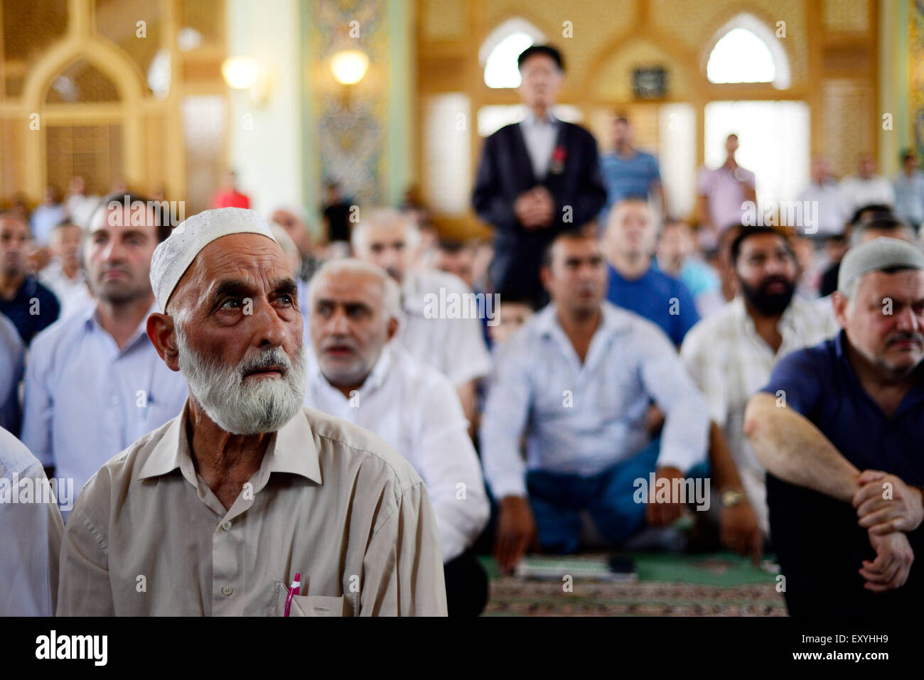Baku, Azerbaijan. 18th July, 2015. Local Muslims attend a prayer ...
