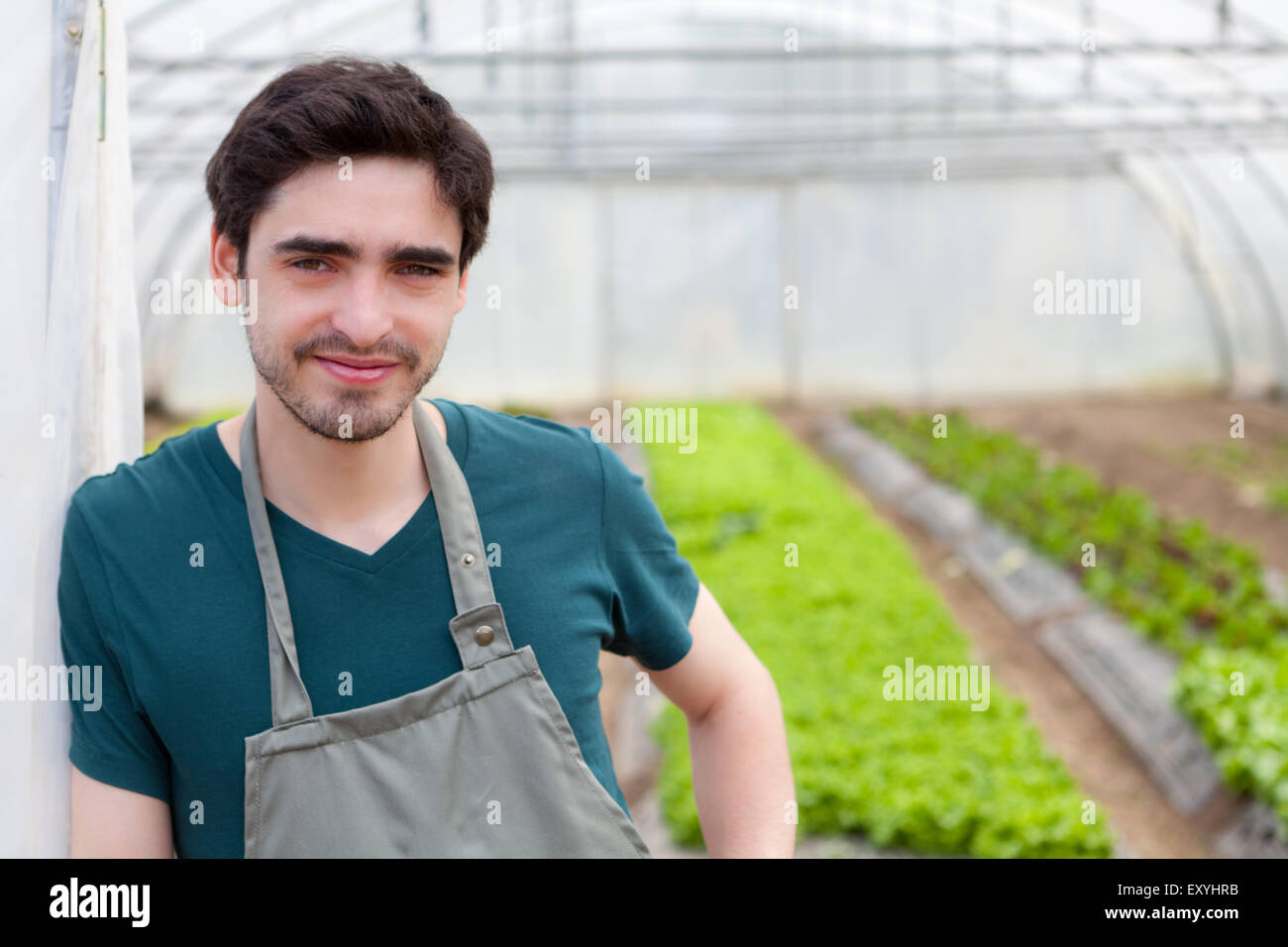 View of a Portrait of a young attractive farmer Stock Photo - Alamy