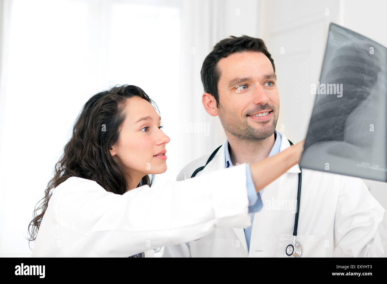 View of a Young doctor and nurse analysing radiography Stock Photo - Alamy