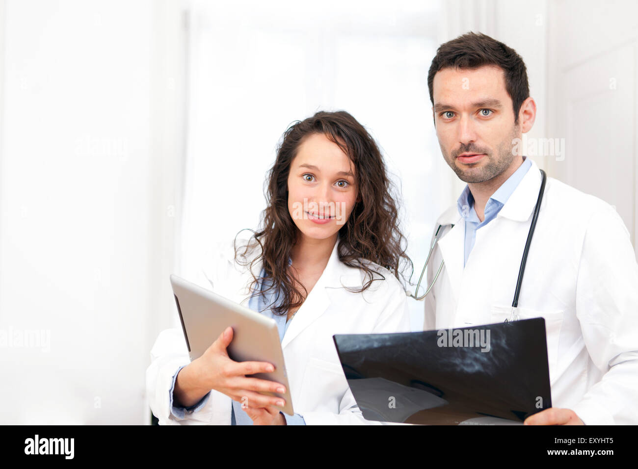View of a Young doctor and nurse analysing radiography Stock Photo - Alamy