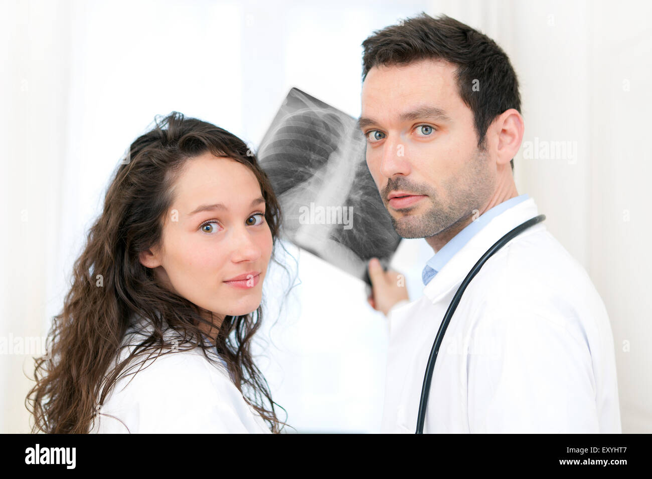 View of a Young doctor and nurse analysing radiography Stock Photo - Alamy